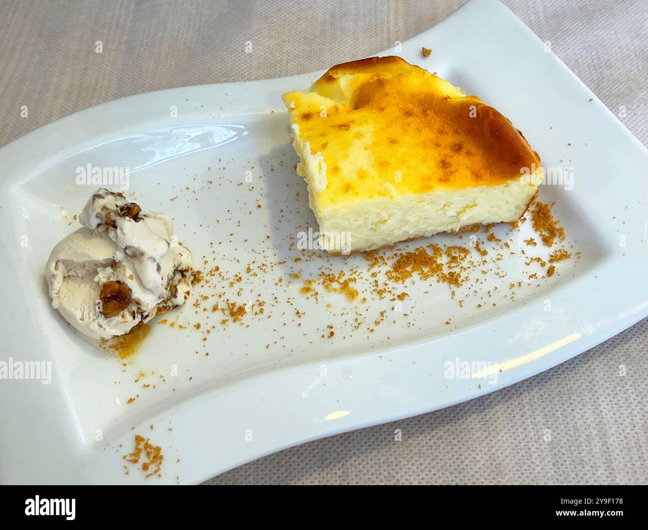 Cheese cake with ice cream. Spain Stock Photo - Alamy