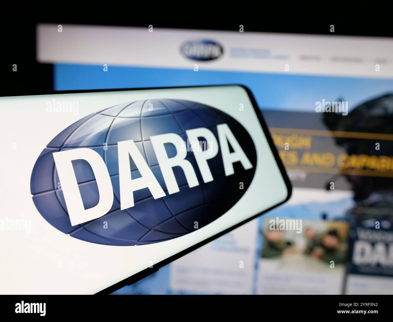 Smartphone with logo of Defense Advanced Research Projects Agency ...