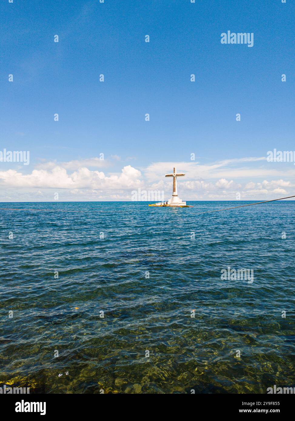 Big cross in the middle of the sea. Sunken Cemetery in Camiguin Island ...