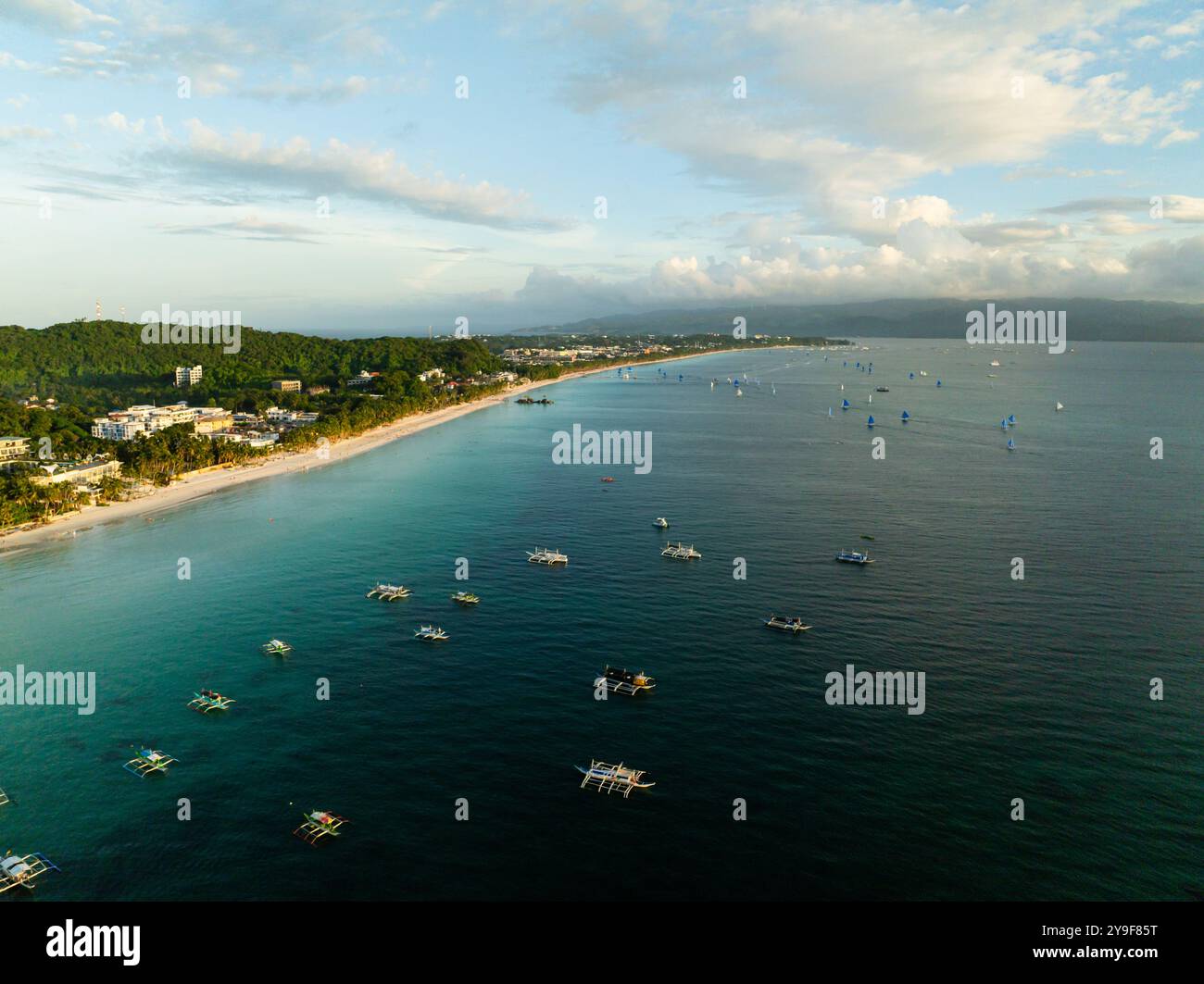 White beaches with turquoise sea water. Dusk time in Boracay ...