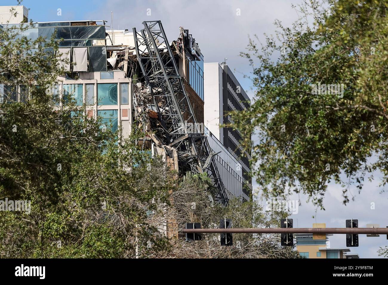 A high rise construction crane broke apart and crashed into the ...