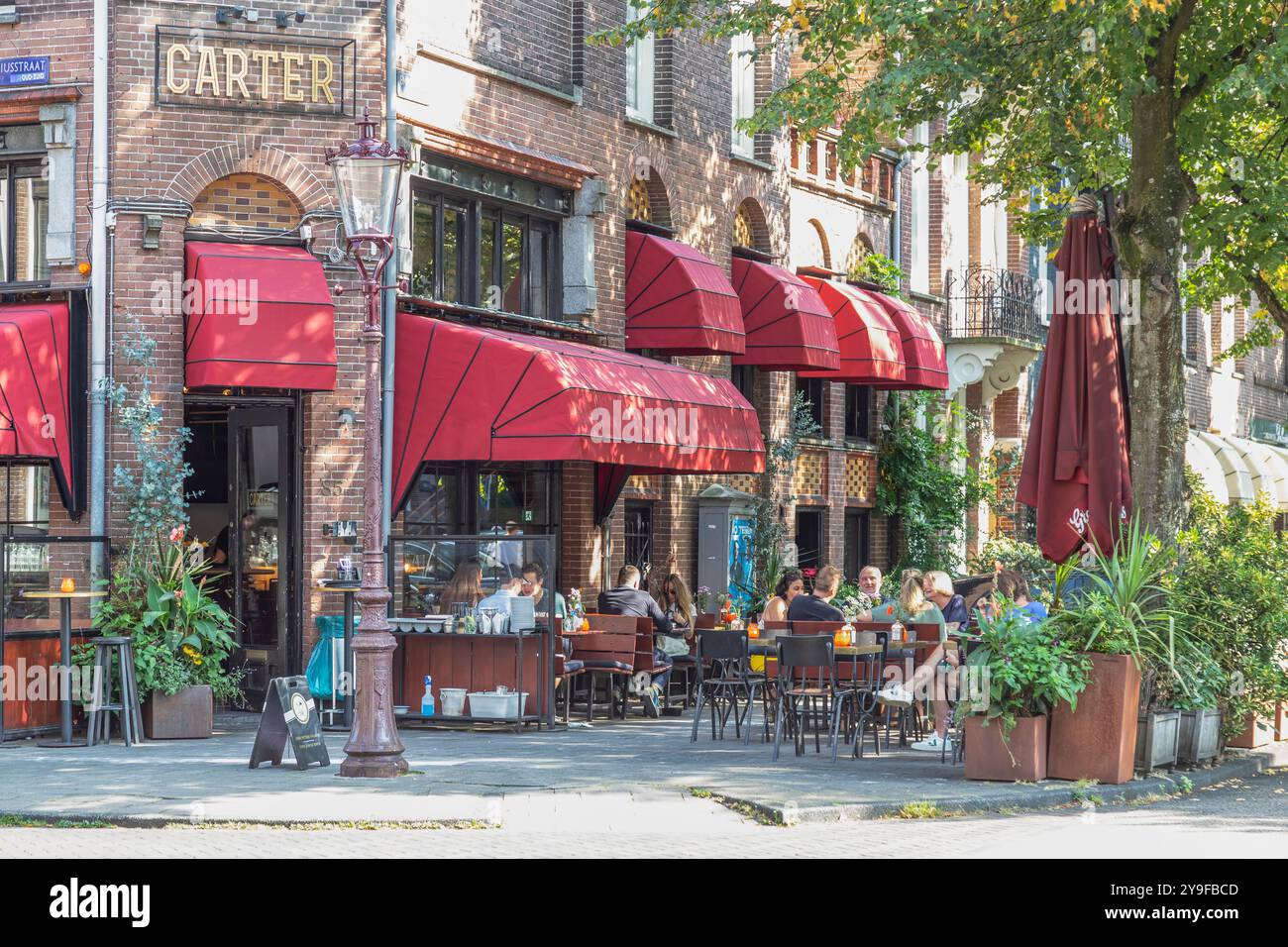 People enjoy the terrace of Carter restaurant and cocktail bar in the ...