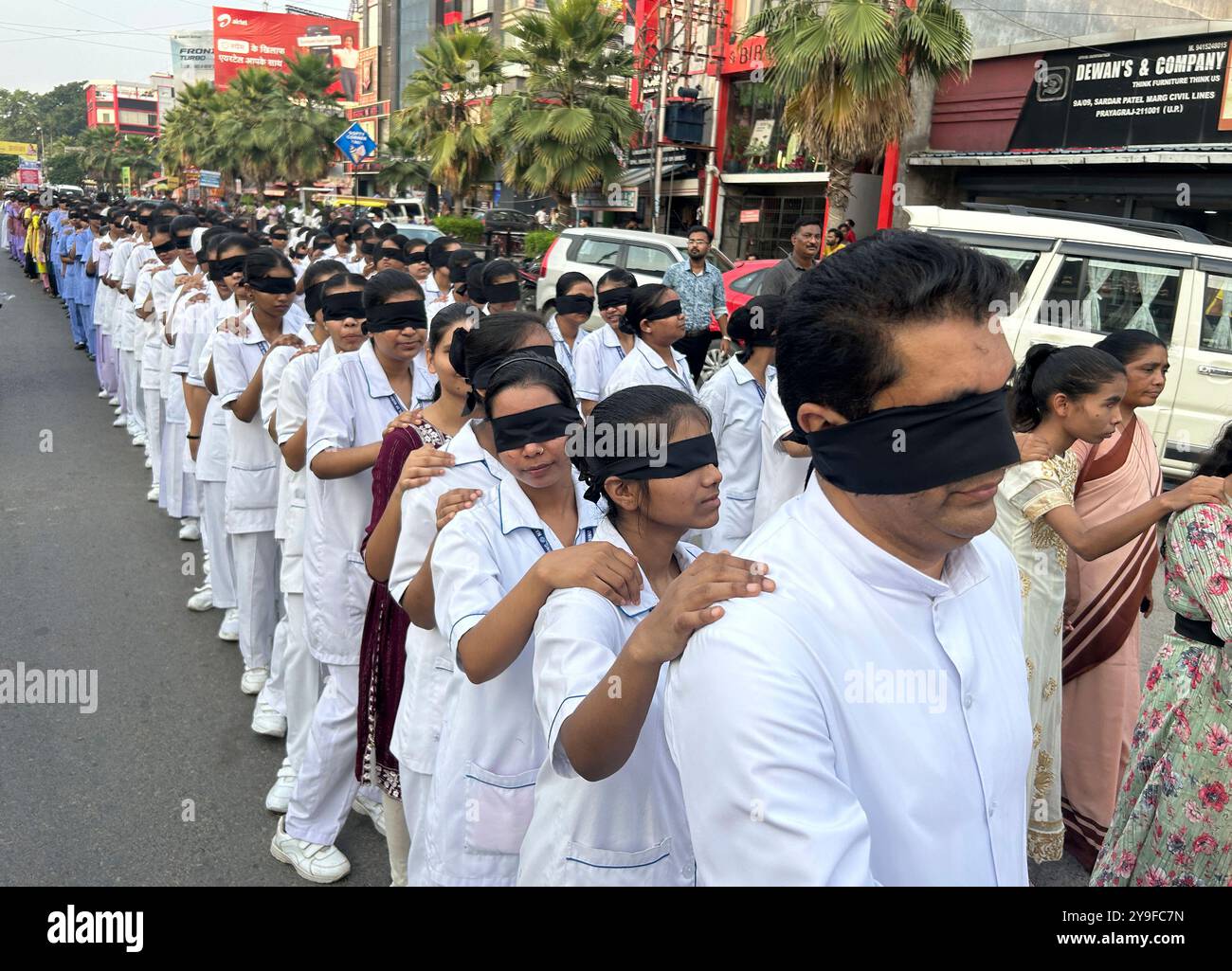 Indian nurses, students of Nazareth hospital wearing black ribbon over ...