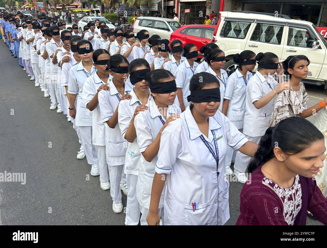 Indian nurses, students of Nazareth hospital wearing black ribbon over ...