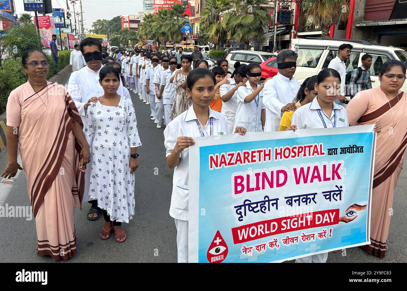 Indian nurses, students of Nazareth hospital wearing black ribbon over ...