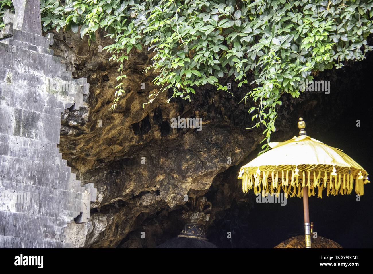 Temple complex of the Hindu faith. Temple made of lava stone in front ...