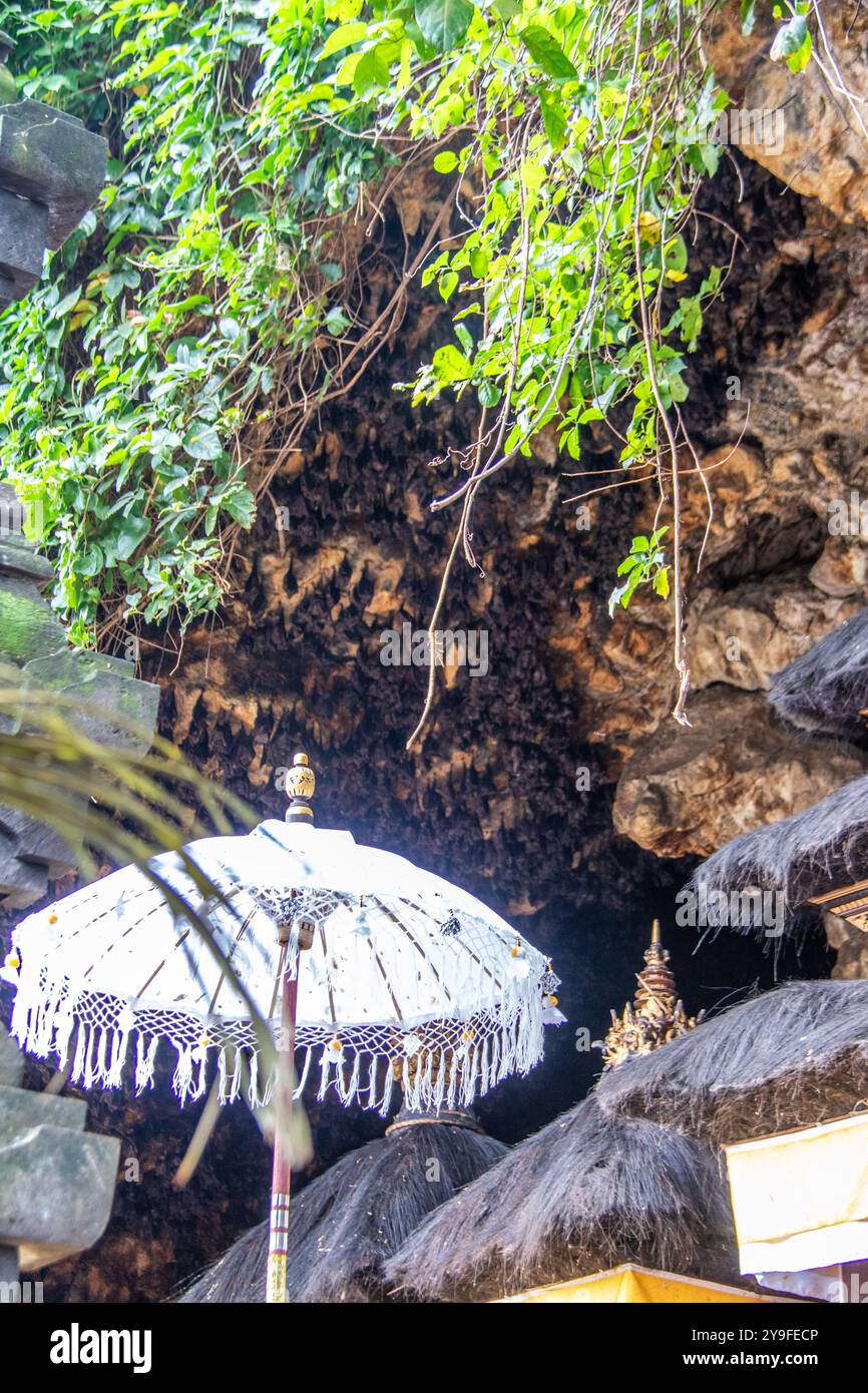 Temple complex of the Hindu faith. Temple made of lava stone in front ...