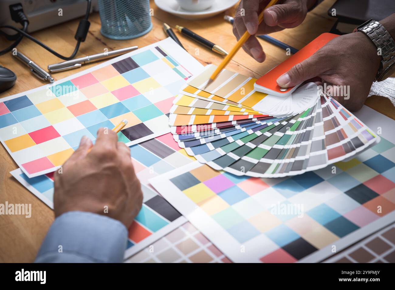 Interior designer chooses a color chart for home design. Graphic ...