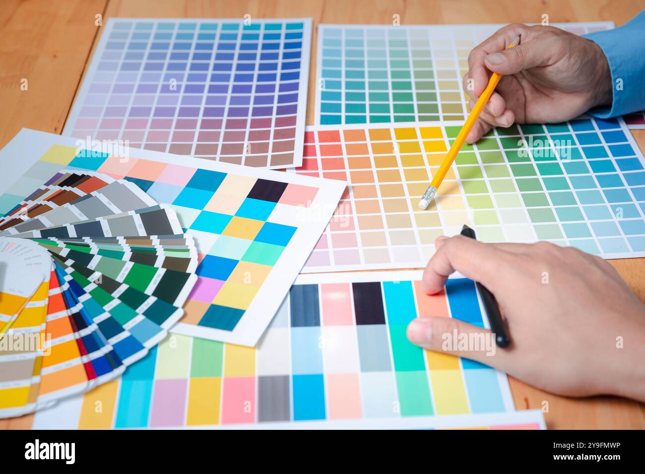 Interior designer chooses a color chart for home design. Graphic ...