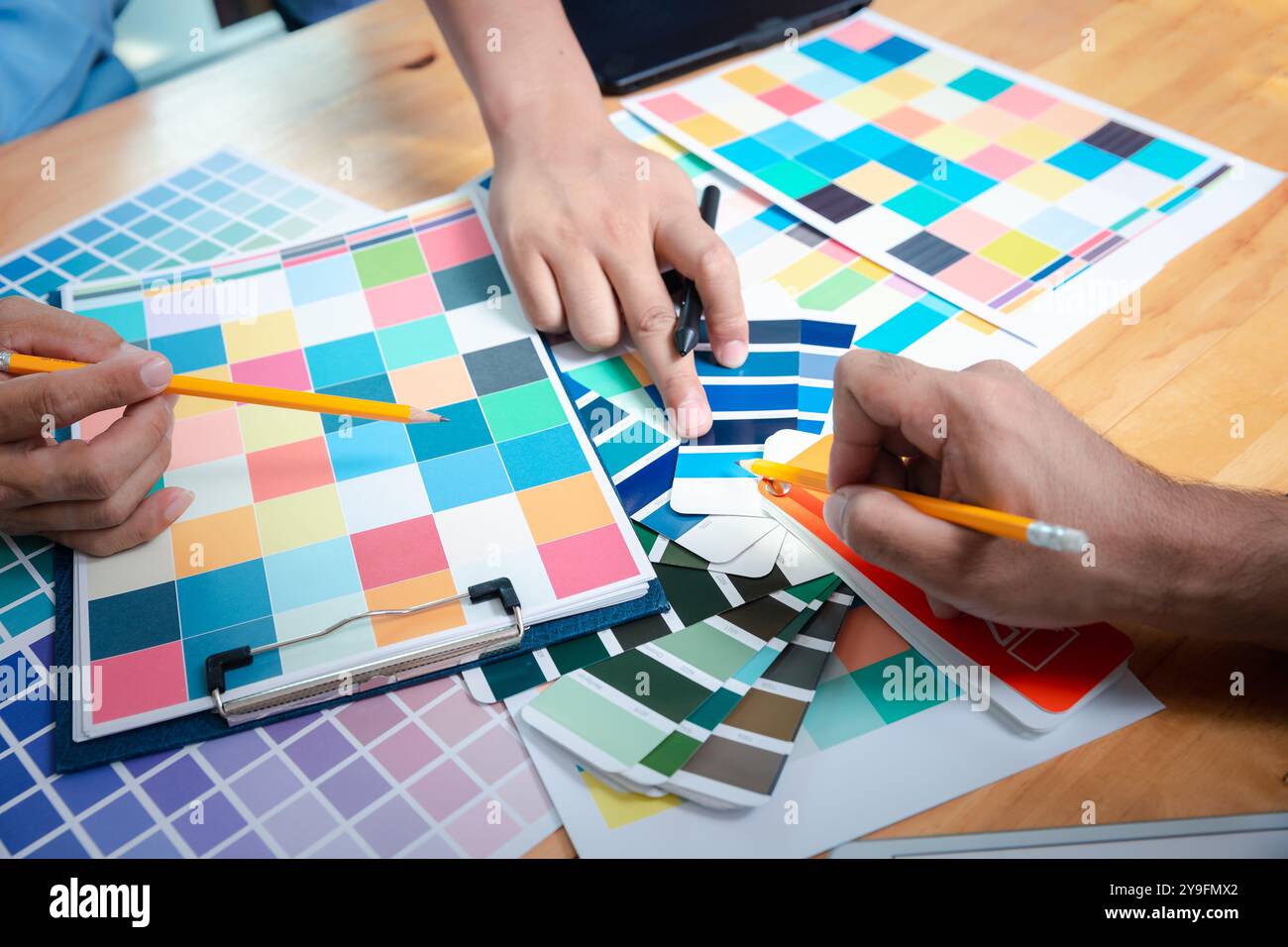 Interior designer chooses a color chart for home design. Graphic ...
