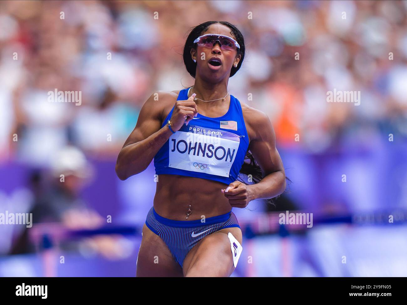 Alaysha Johnson participating in the 100 meters hurdles at the Paris ...