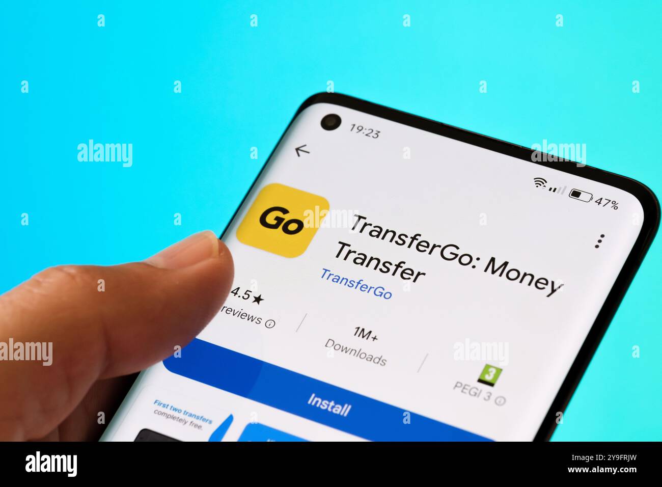 TransferGo Money Transfer app displayed on a smartphone screen with ...