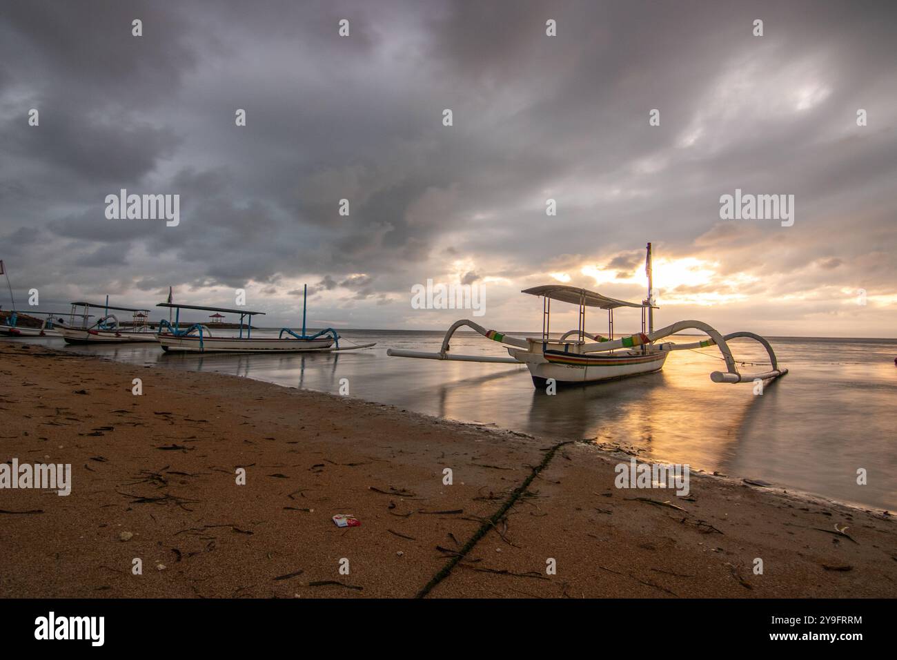 Sanur, Bali. Beach on the Island of the Gods. Sunrise at the sea with ...