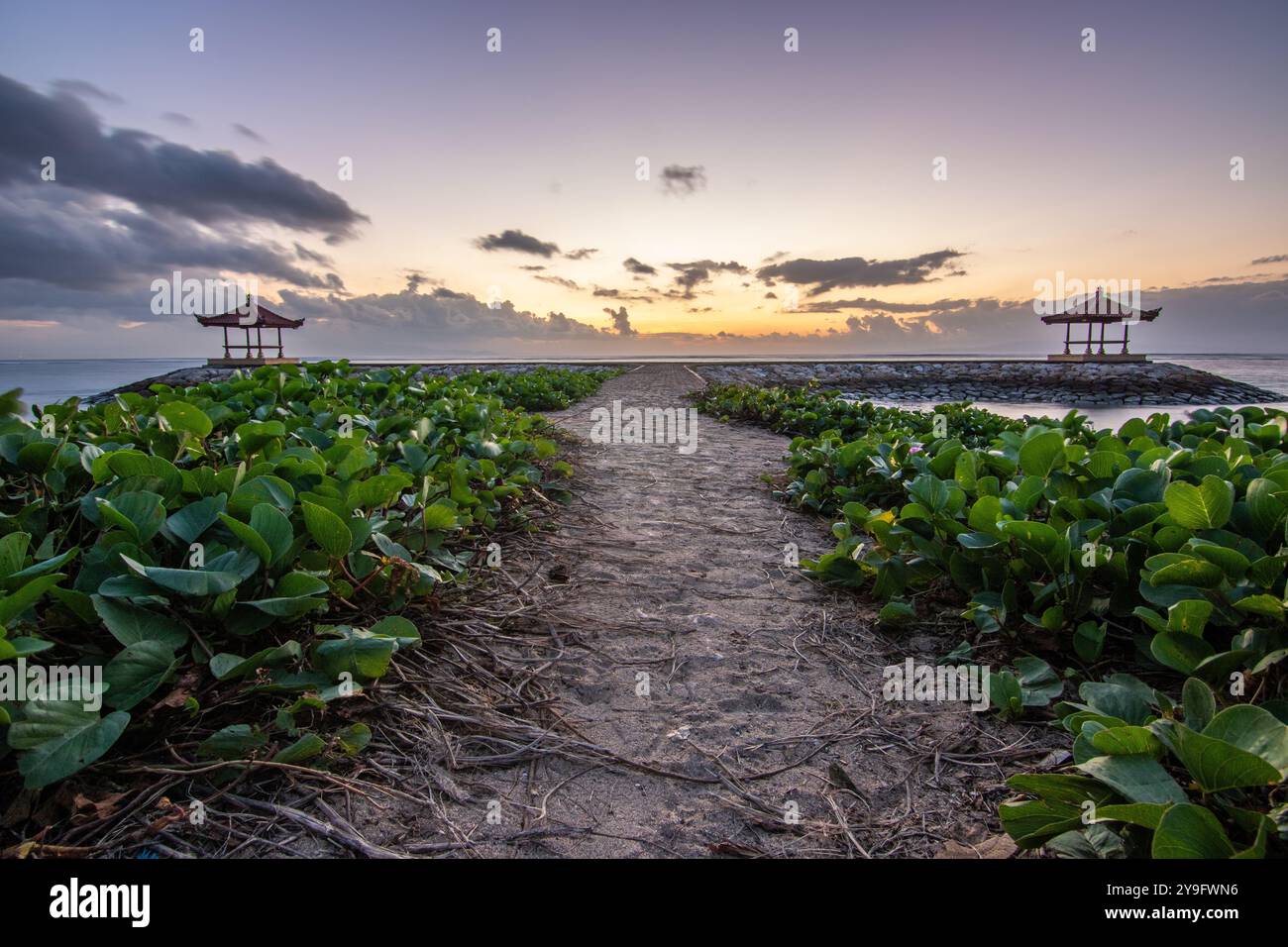 Magical sunrise with clouds in the sky. Dramatic sky at Sanur beach ...