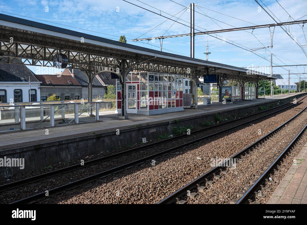 Platform and tracks of the railway station of Aalst, East Flanders ...