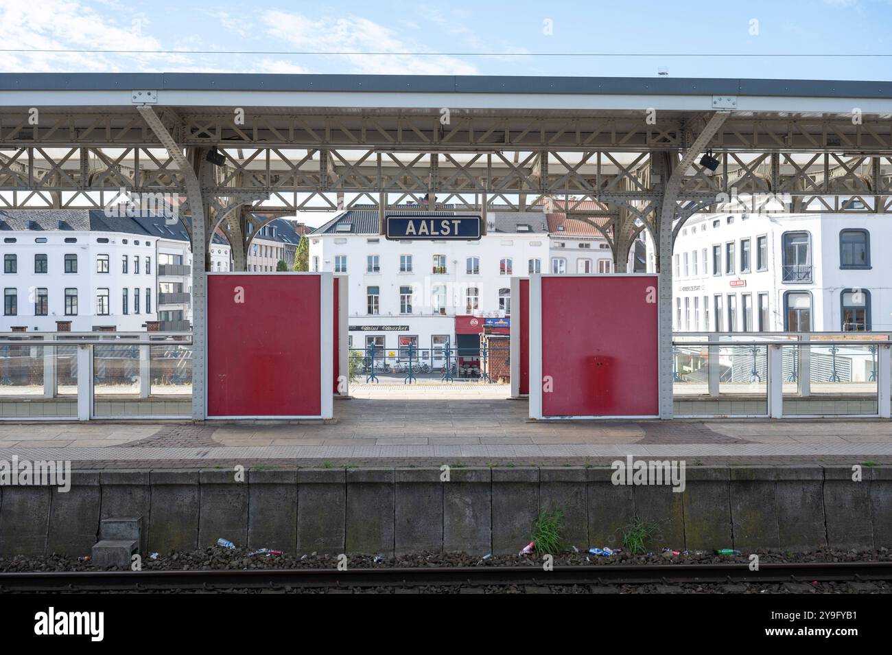 Platform and tracks of the railway station of Aalst, East Flanders ...