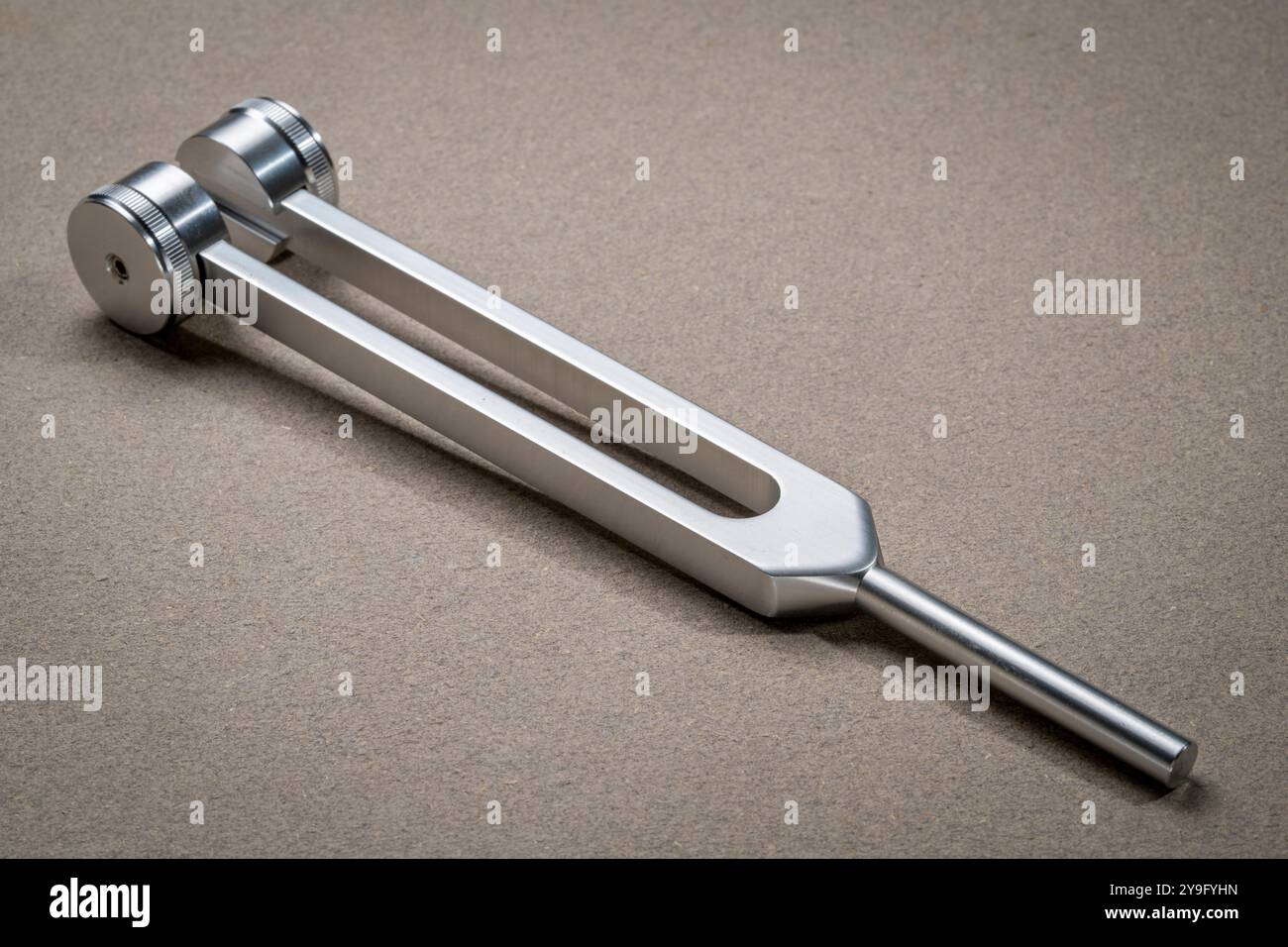 Metal weighted tuning fork used for tuning musical instruments, sound ...