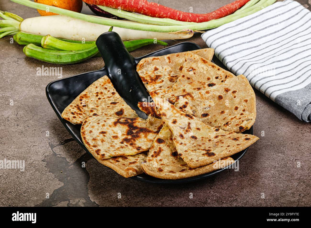 Indian vegetarian Aloo Paratha - bread with potato Stock Photo - Alamy