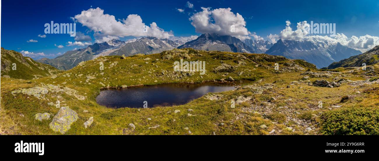 Wide panorama landscape of the Alps mountains in Chamonix valley. Sunny ...