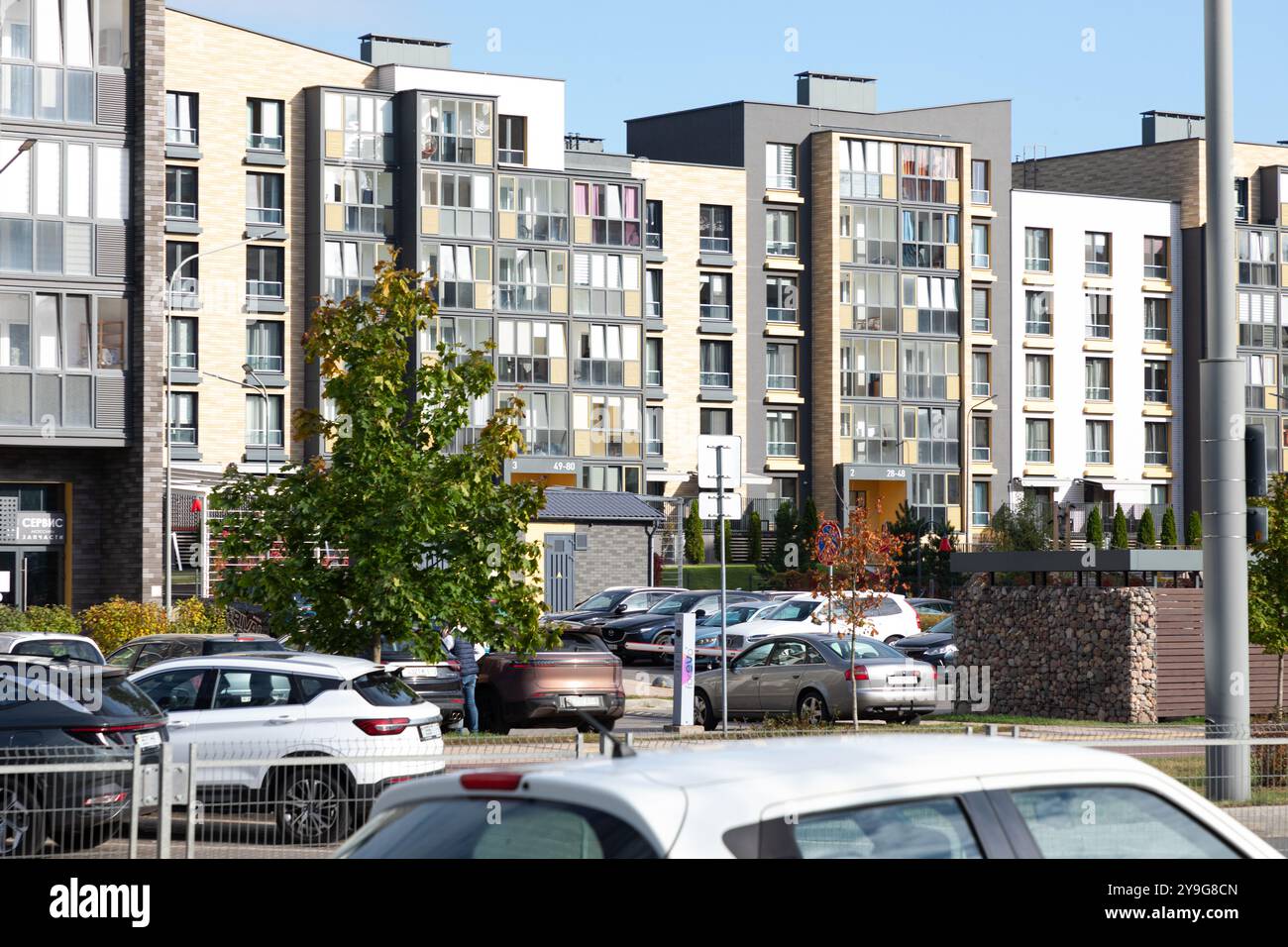 The residential area features contemporary high-rise apartment ...