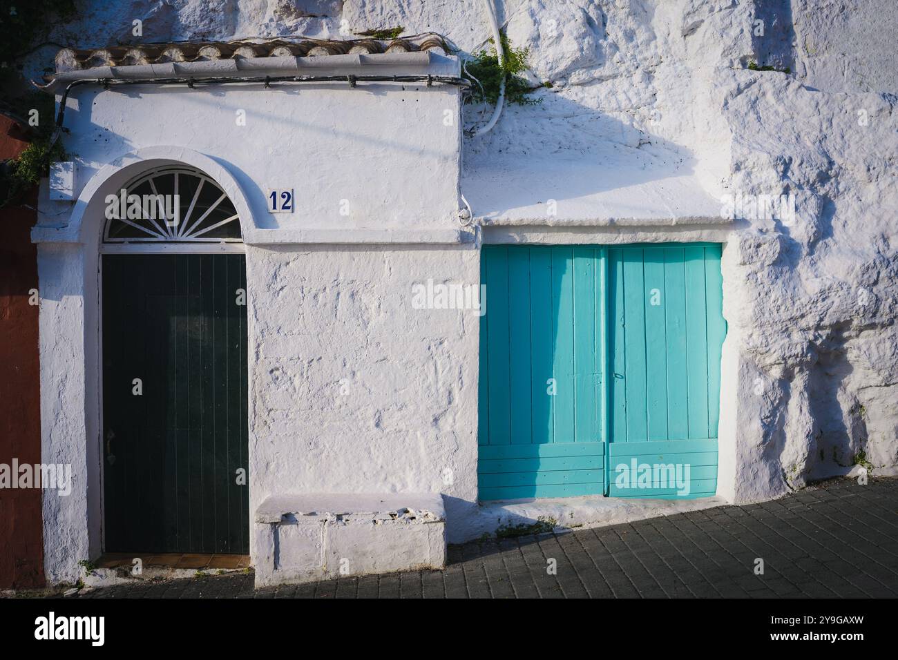Detail of a traditional spanish fishermen house with white walls and ...