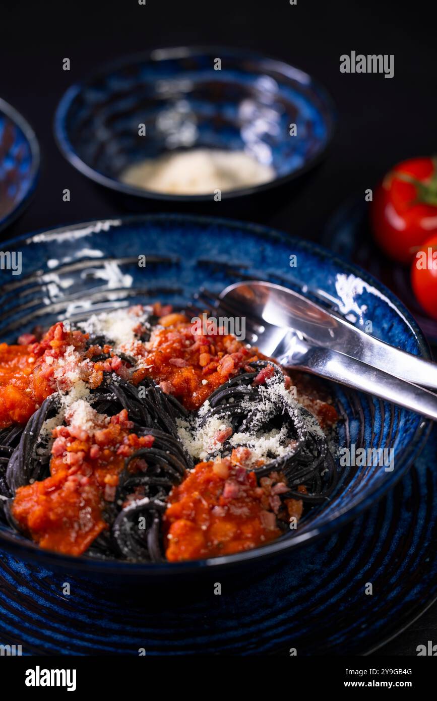 Italian still life with pasta and tomatoes Stock Photo - Alamy