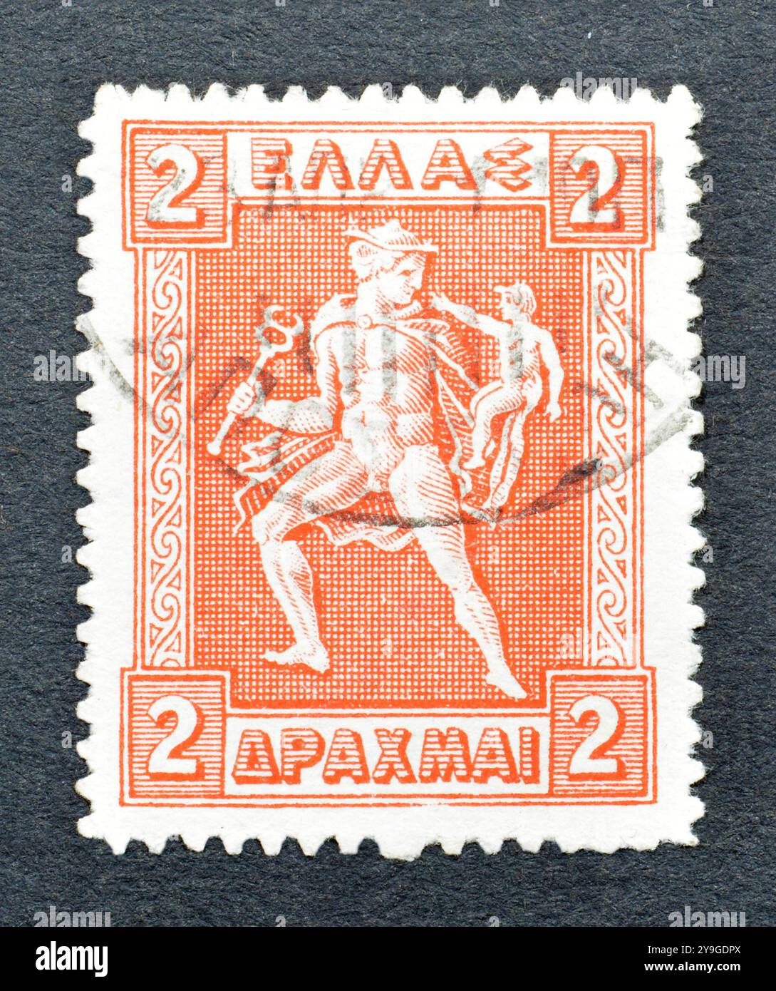 Cancelled postage stamp printed by Greece, that shows Hermes holding ...