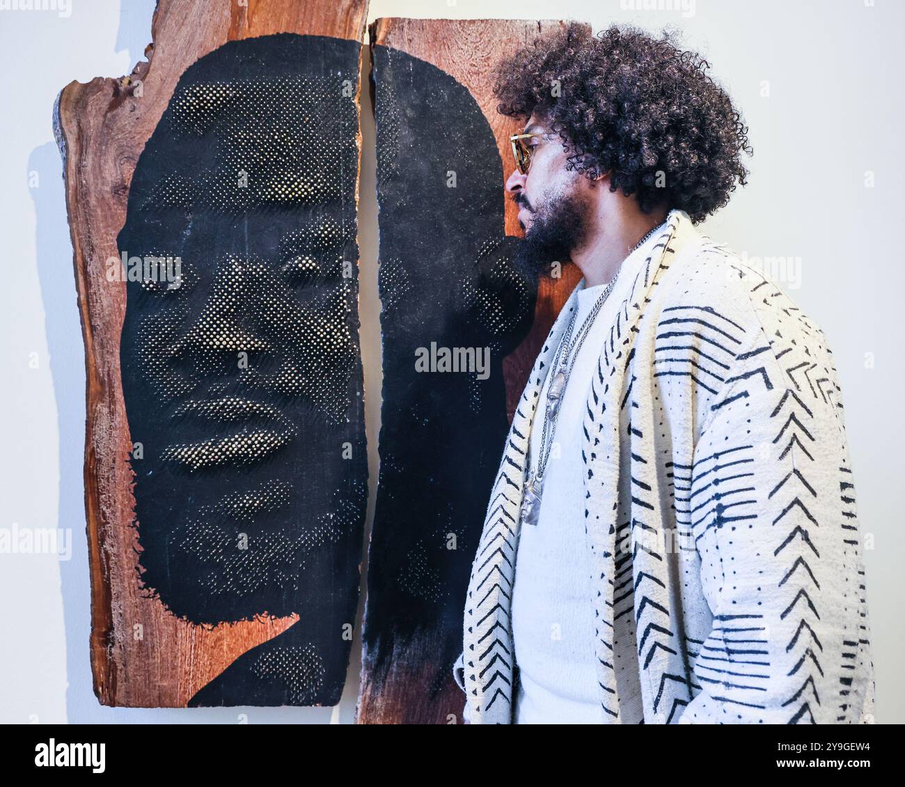 London, UK. 10th Oct, 2024. Artist Alexis Peskine with his work ...