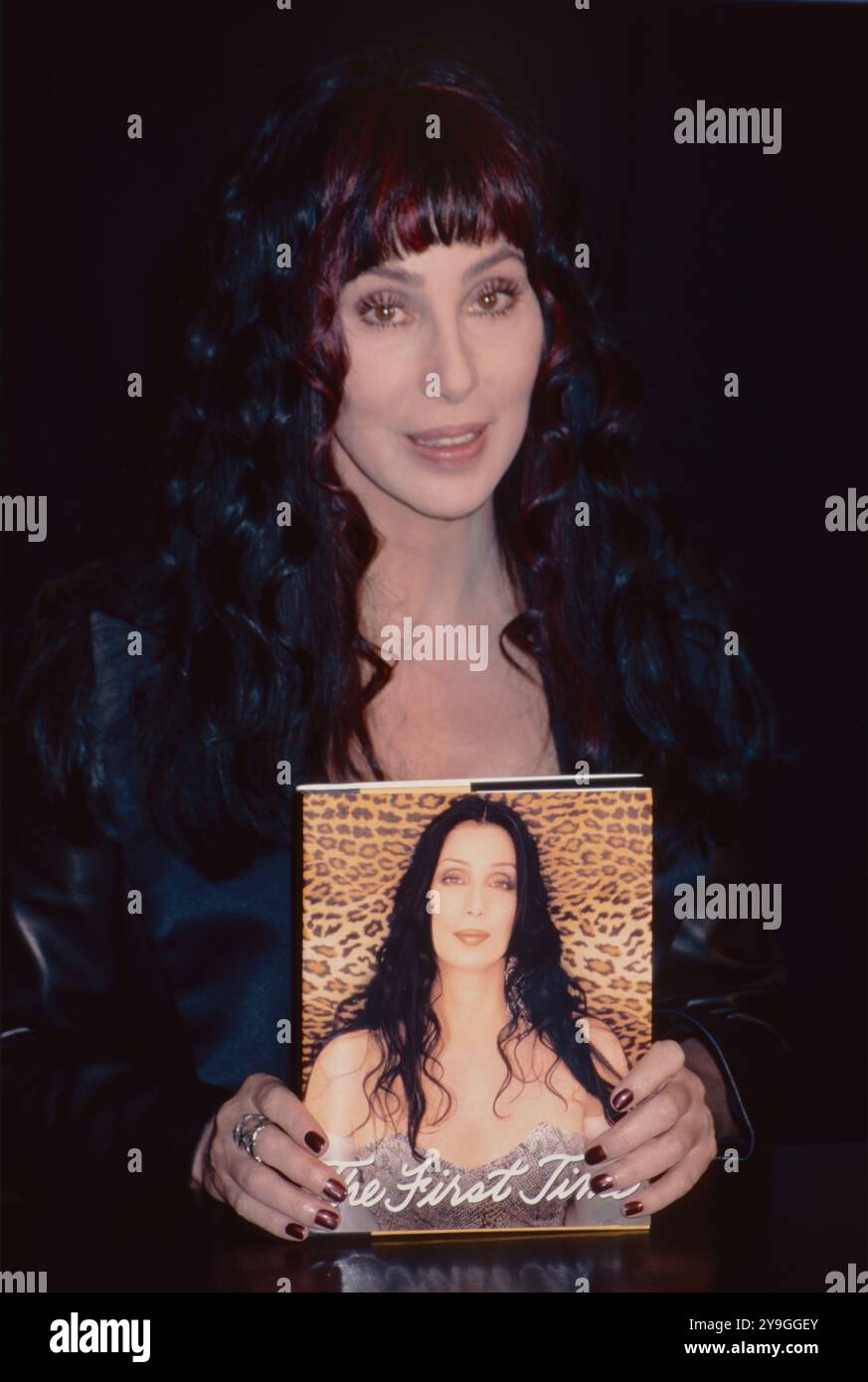 Cher at a in-store appearance signing her album "Believe" and her new ...