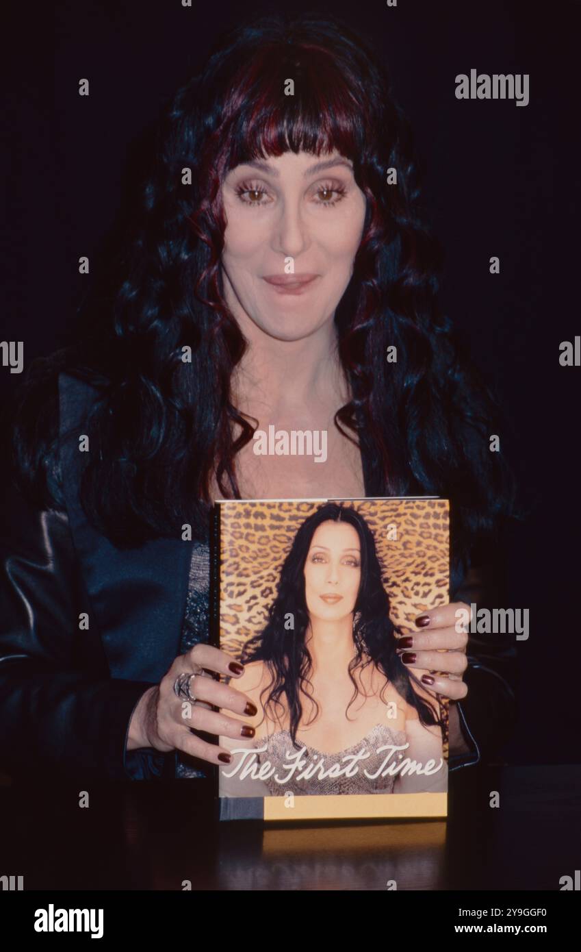 Cher at a in-store appearance signing her album "Believe" and her new ...