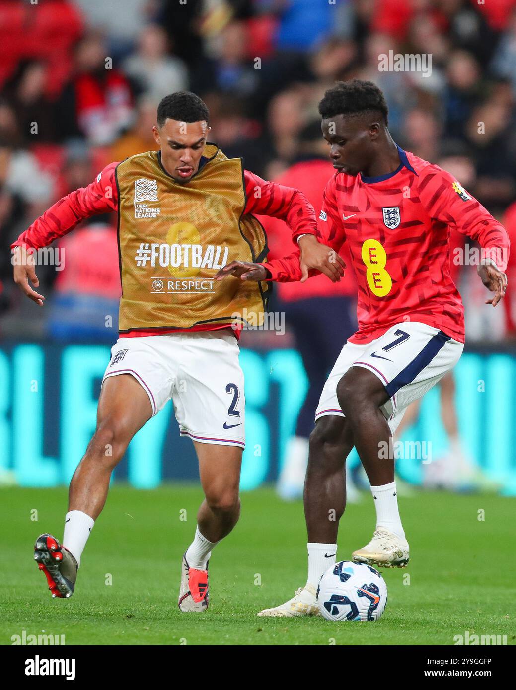Trent Alexander-Arnold and Bukayo Saka of England warms up prior to the ...