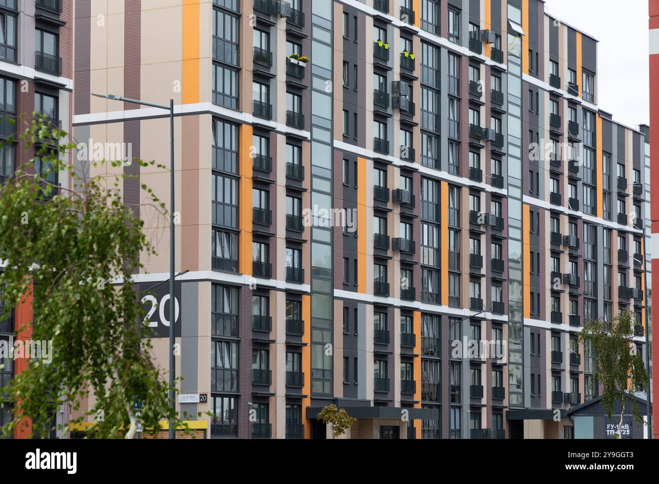 Modern high-rise apartment buildings in a vibrant residential area ...