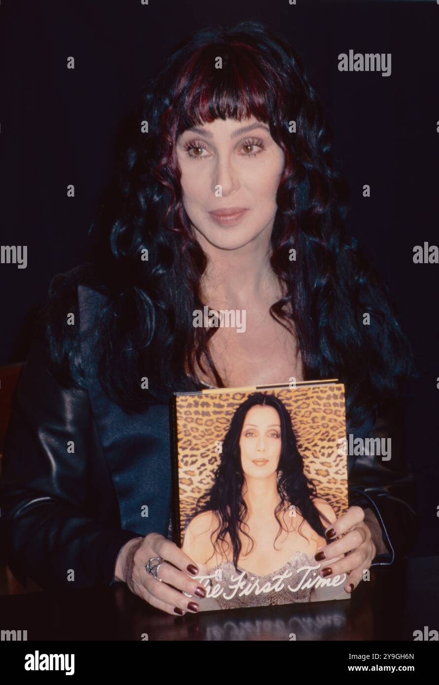 Cher at a in-store appearance signing her album "Believe" and her new ...