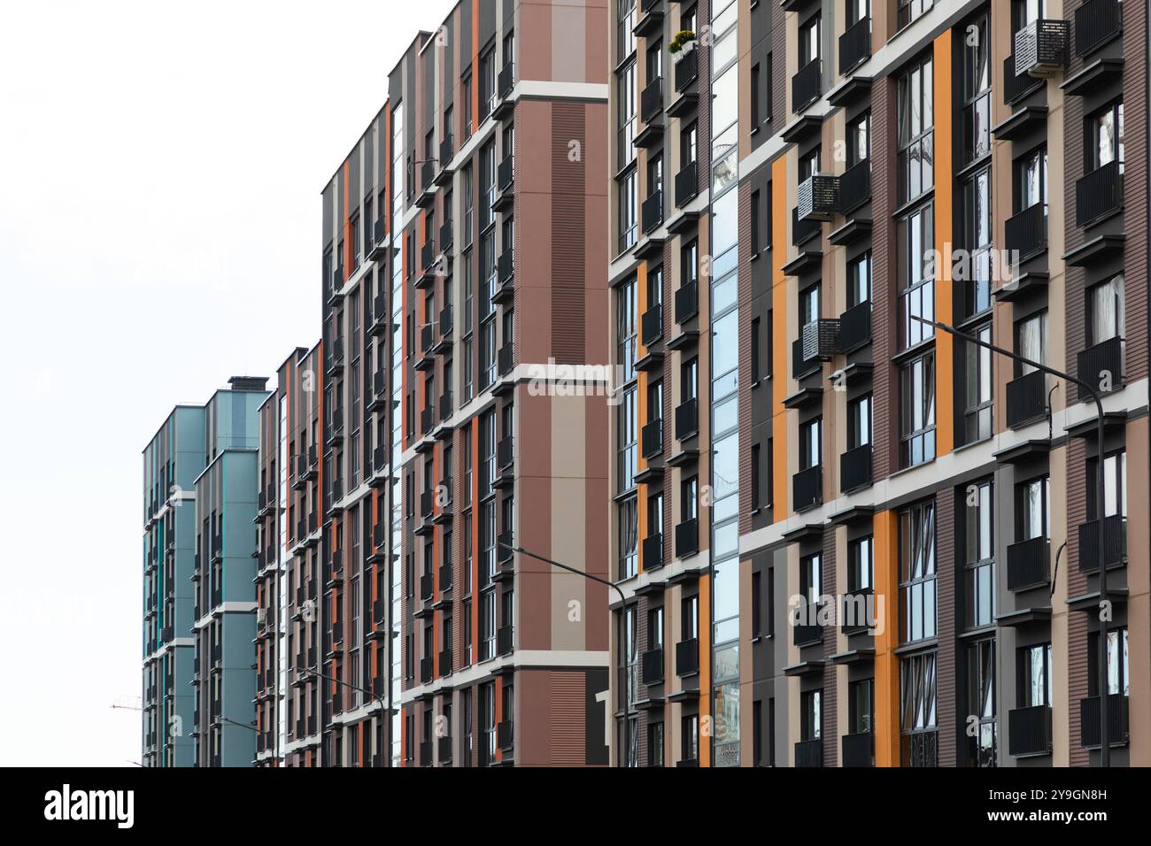 Modern high-rise apartment buildings in a residential area with diverse ...