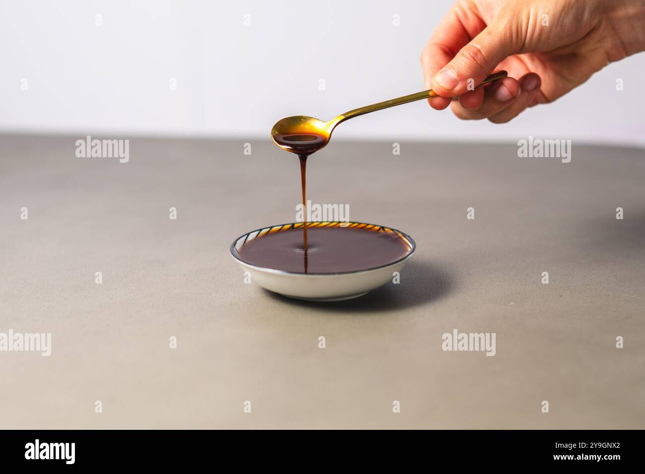 Sesame Soy Dressing Dripping Down Stock Photo - Alamy