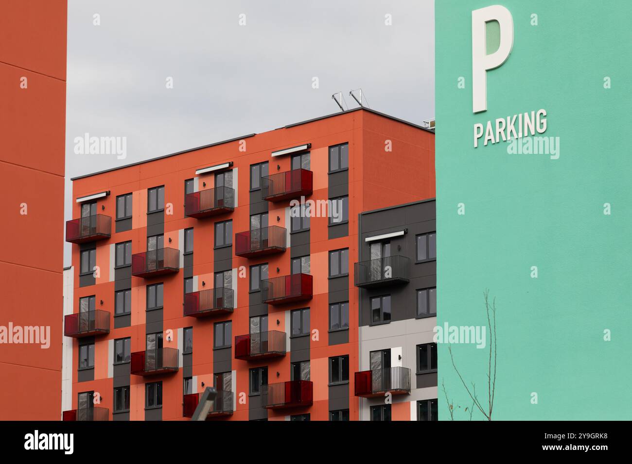 High-rise apartment buildings in a residential area with parking ...