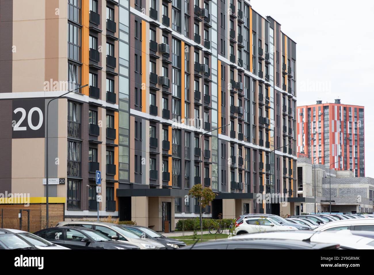 Modern high-rise apartment buildings in a vibrant residential area with ...