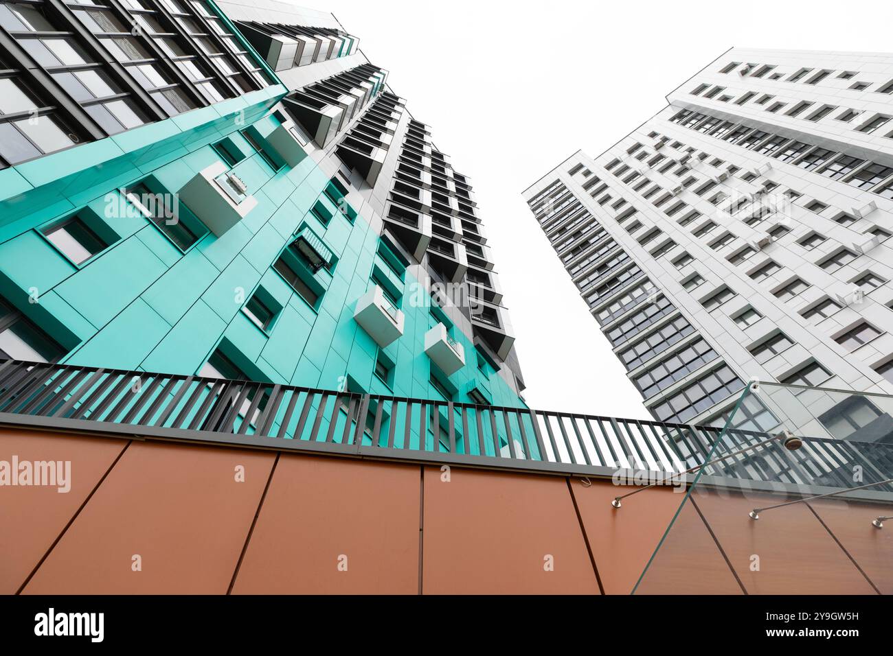 The viewpoint captures towering high-rise apartment buildings in a ...