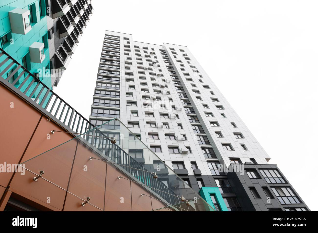 Modern high-rise apartment buildings in a residential area with varied ...