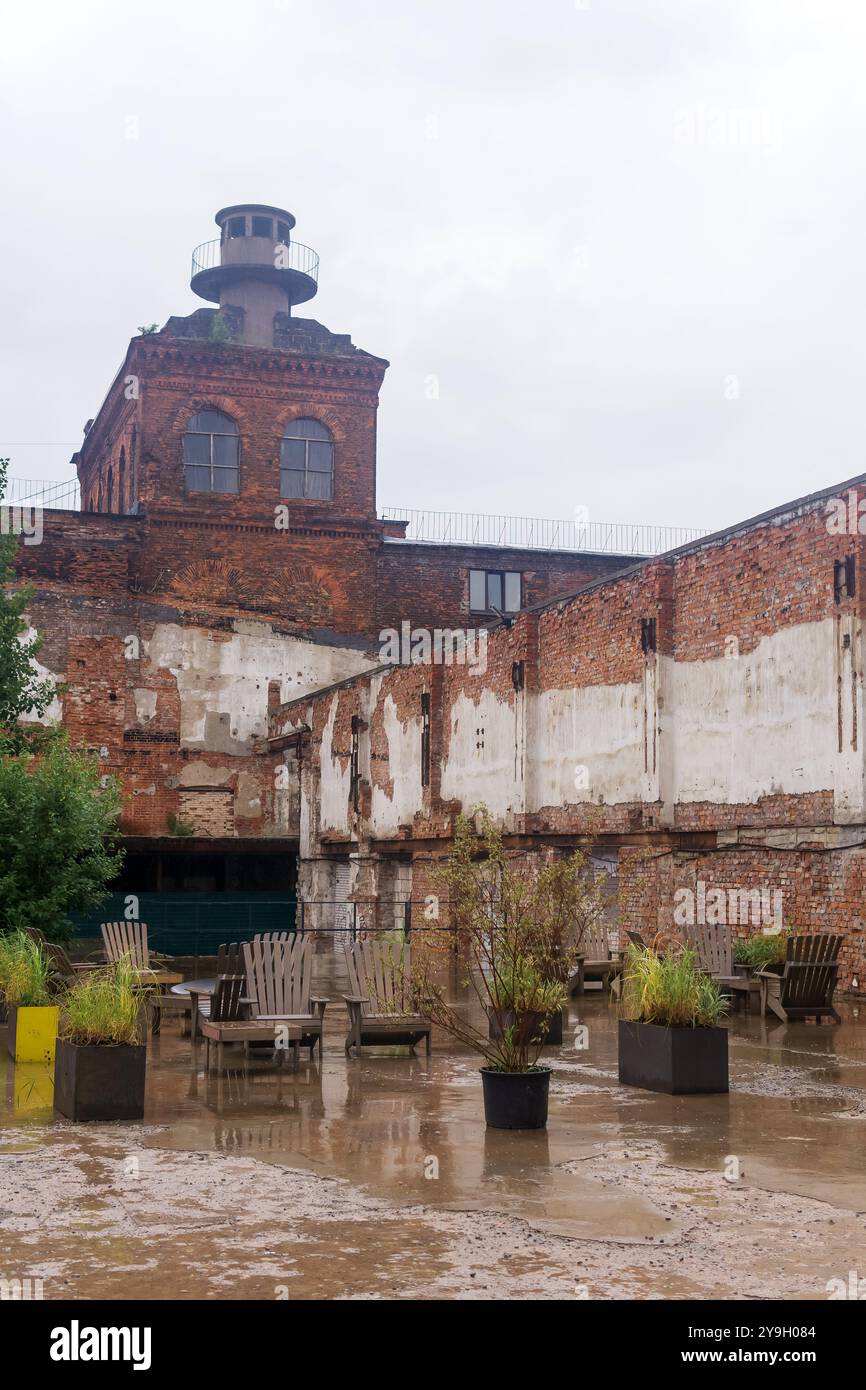 public space on the territory of the former factory in rainy weather ...