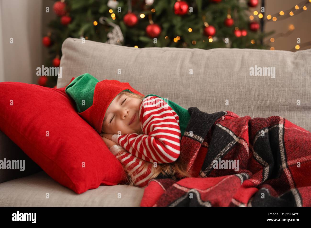 Cute little elf sleeping at home on Christmas eve Stock Photo - Alamy