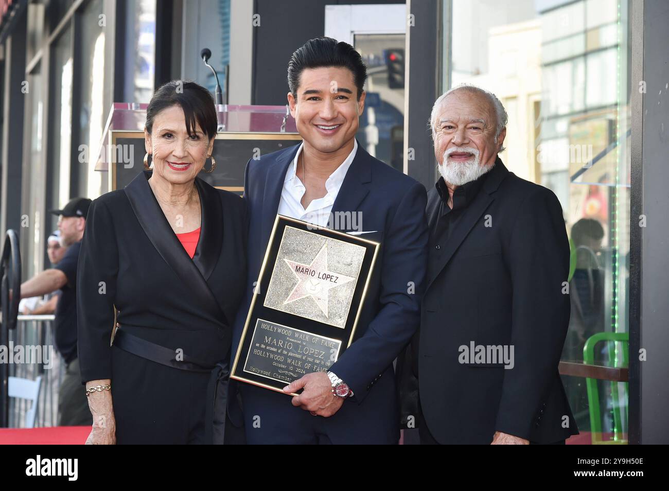 Elvia Lopez, from left, Mario Lopez, and Mario Michael Lopez, Sr ...