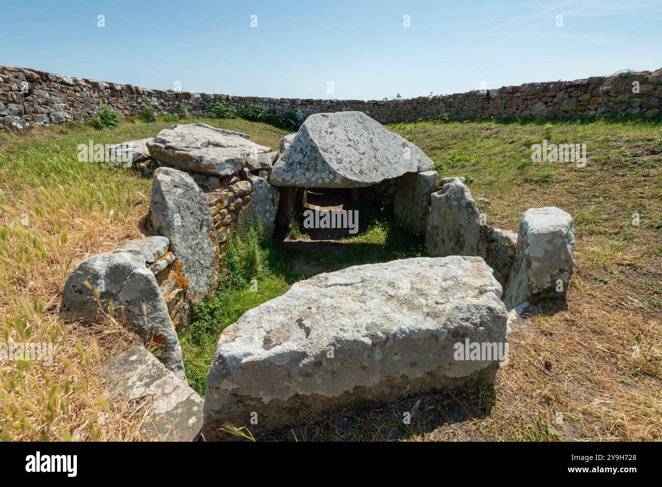 A dolmen, a prehistoric megalithic tomb, stands as a testament to ...