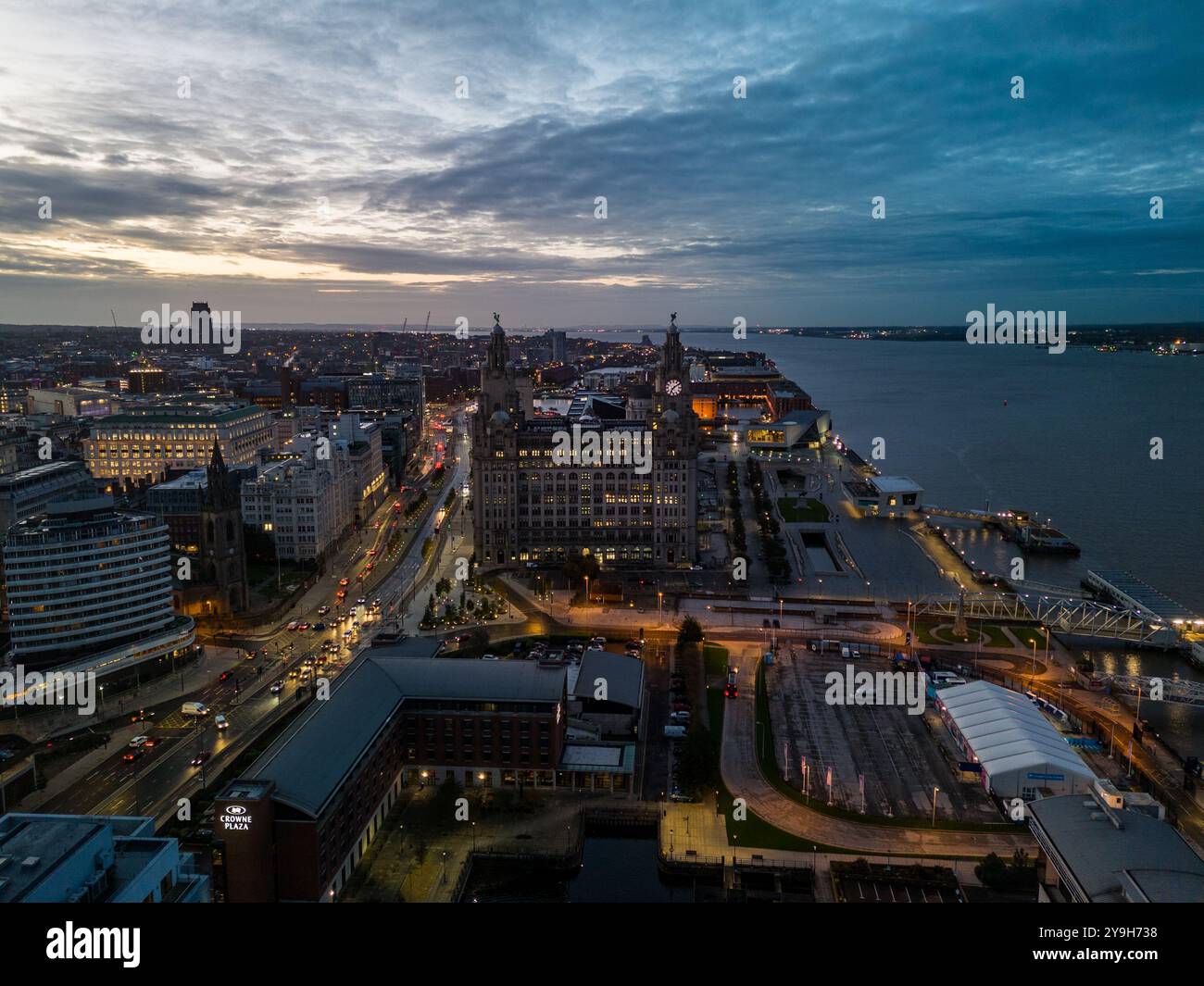 Aerial view of liverpool city center at dusk, showing the royal liver ...