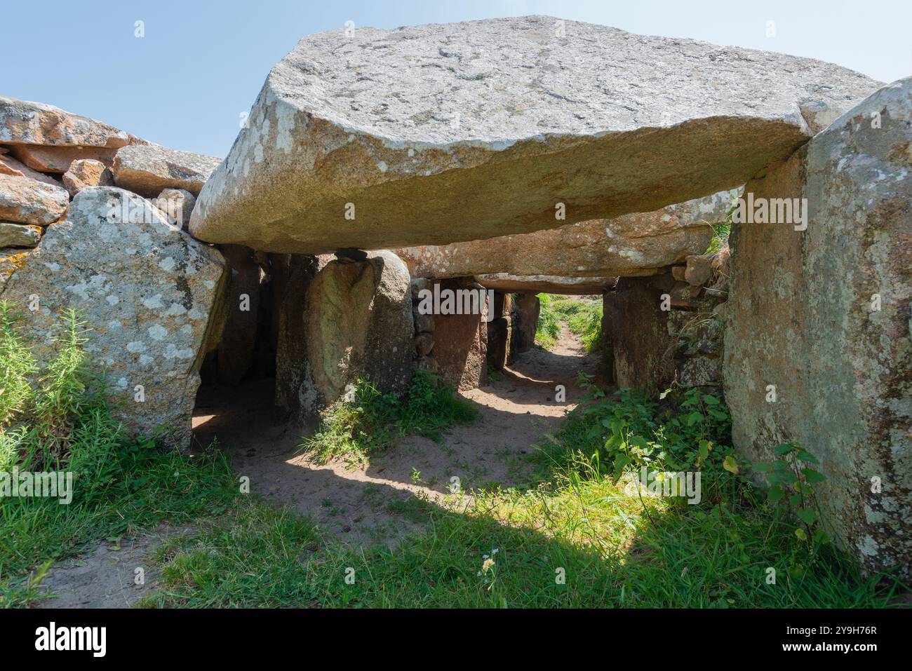 A dolmen, a prehistoric megalithic tomb, stands as a testament to ...
