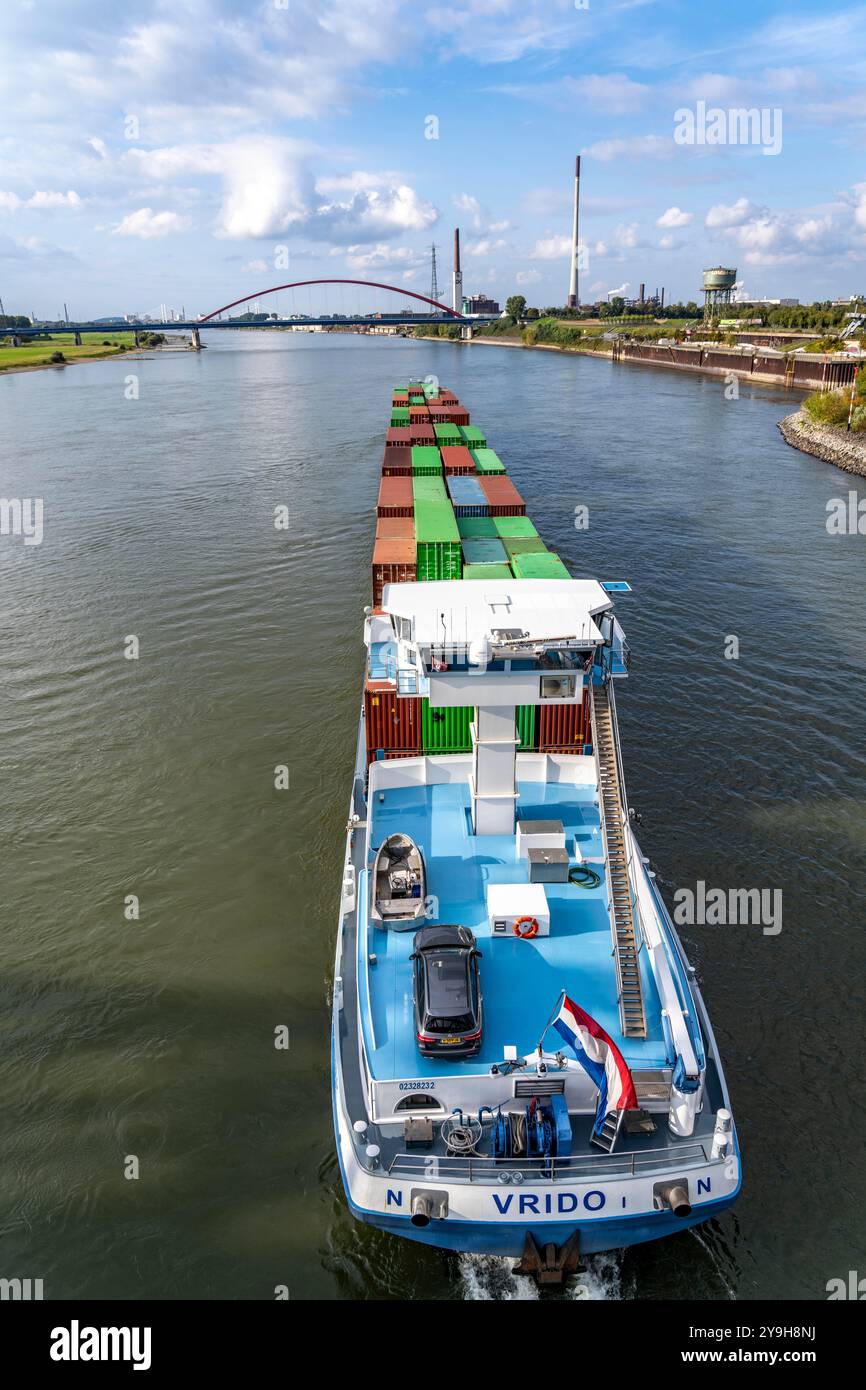 The Dutch cargo ship Vrido, loaded with containers, on the Rhine near Duisburg, downstream ...