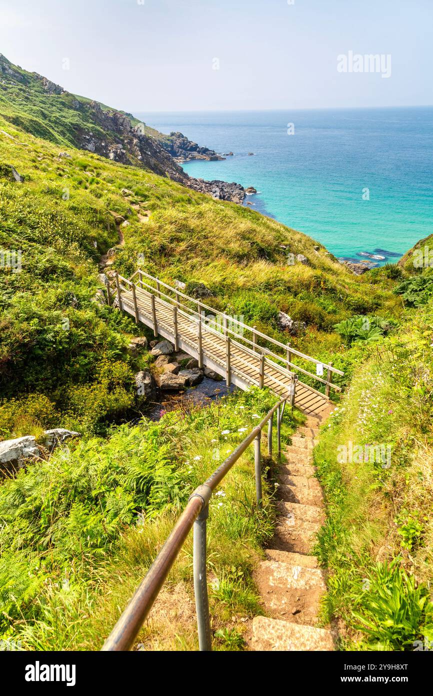 Bridge along the trail of South West Coast Path at Pendour Cove ...