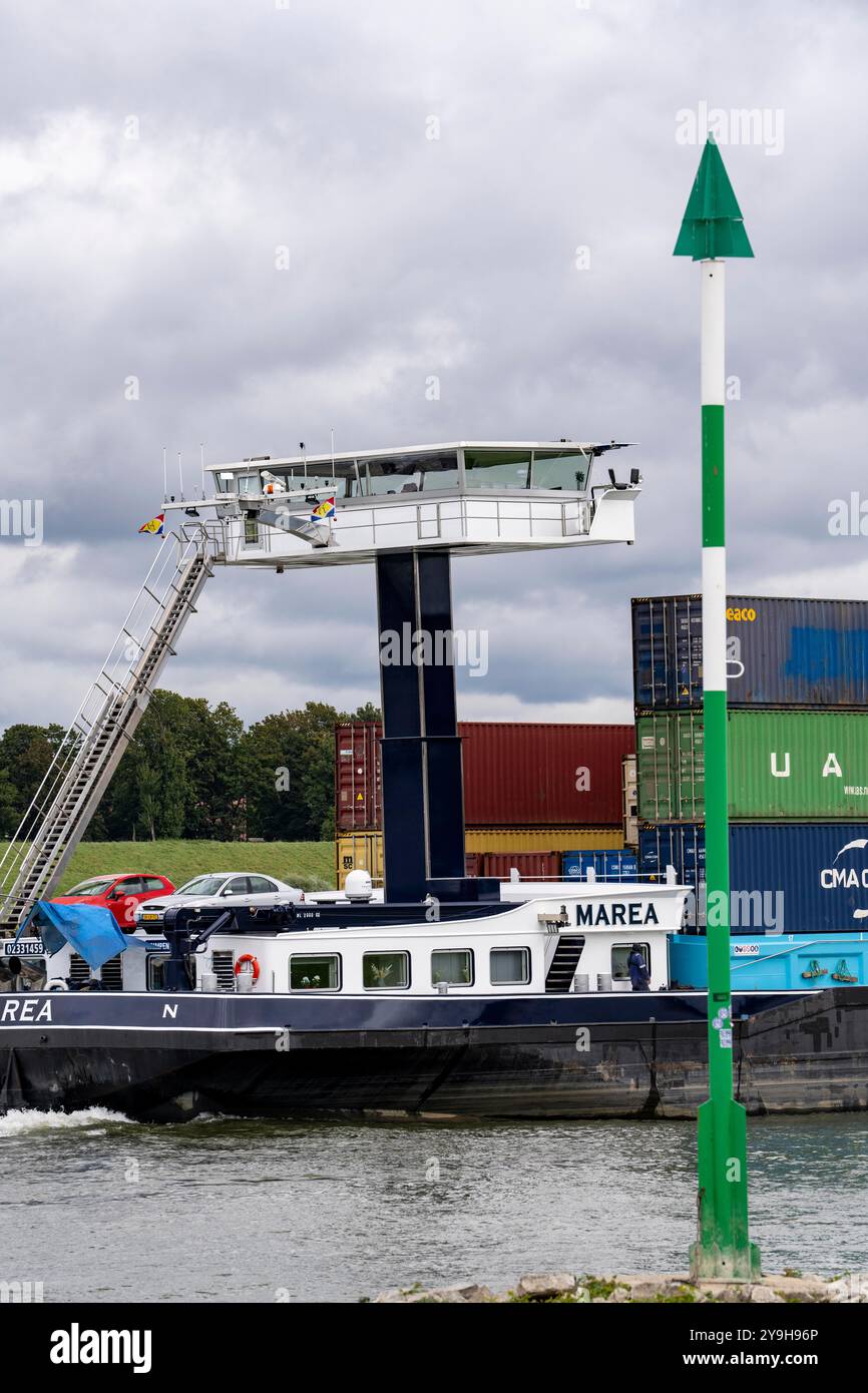 Cargo ship, loaded with containers, on the Rhine near Duisburg, the ...