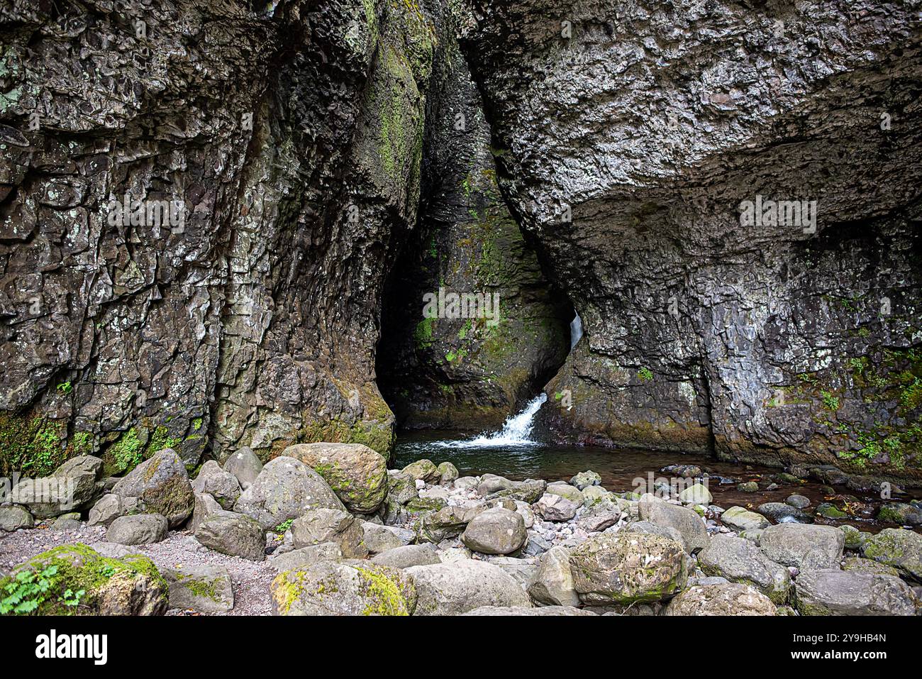 Landscape photography of waterfall in Smuggler’s Cave, Alva glen ...