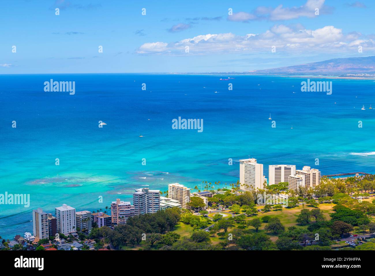Oceanfront buildings and houses along the Waikiki coastline facing the ...